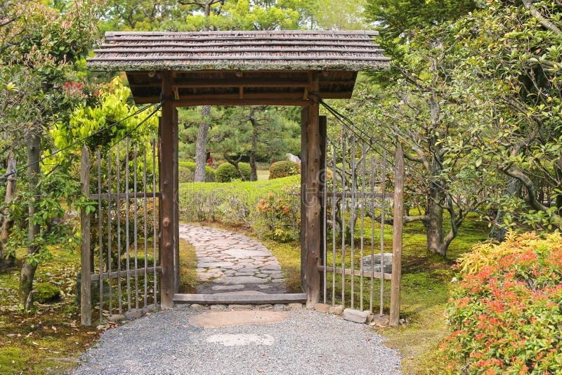 Wooden Gate with Roof Inside the Garden Stock Photo - Image of bush ...