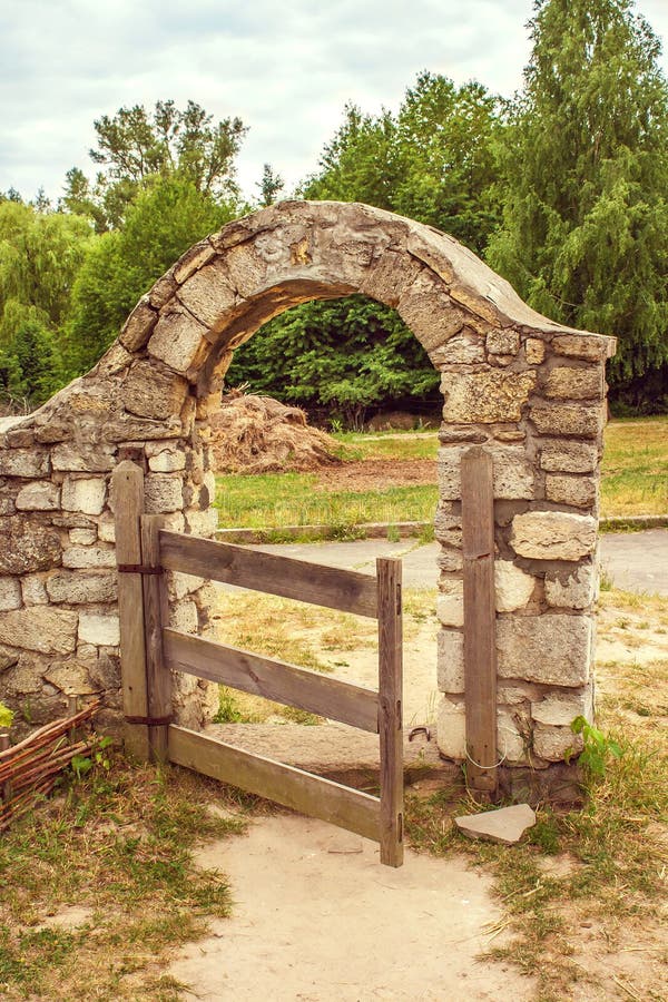 Wooden Gate in the Stone Fence Stock Photo - Image of feature, doorway ...