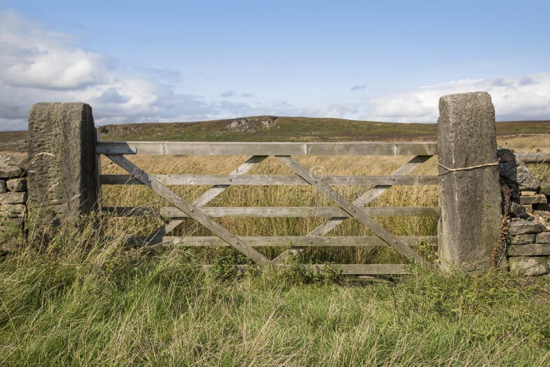 A Wooden Gate and Stone Gateposts Stock Photo - Image of kingdom ...