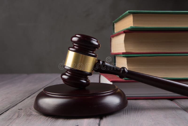 Wooden Gavel and Books on Wooden Table - Law and Auction Concept Stock ...