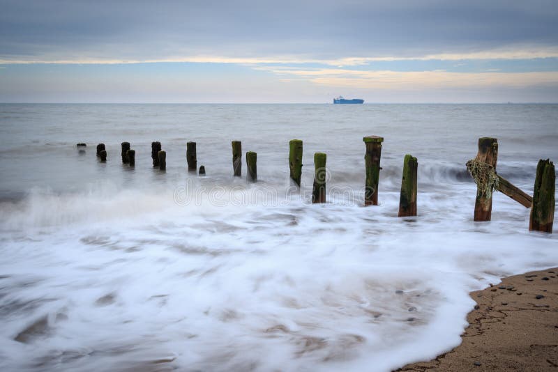 Wooden groynes stock image. Image of landscape, abstract - 77266925