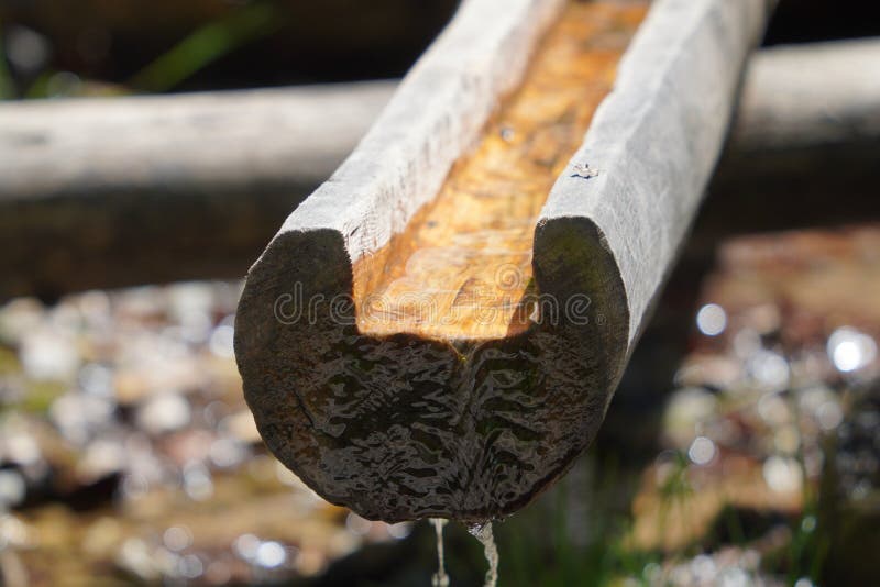 Wooden gutter stock photo. Image of background, spout - 251596030