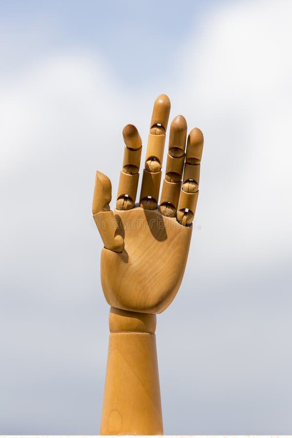 Wooden hand stock photo. Image of greeting, vertical - 64640880