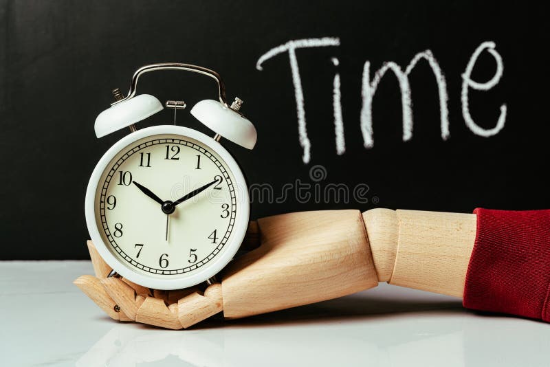 Wooden Hand Holding Alarm Clock Stock Image - Image of contribution ...