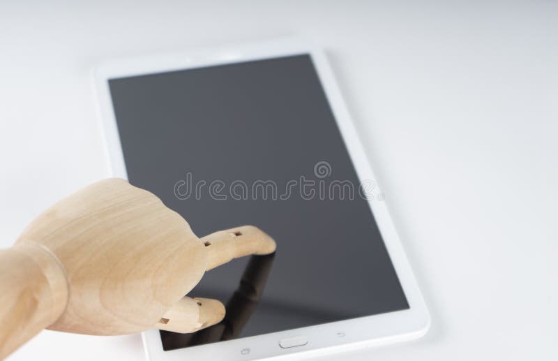 Wooden Hand Touching a White Tablet Stock Photo - Image of robot, male ...