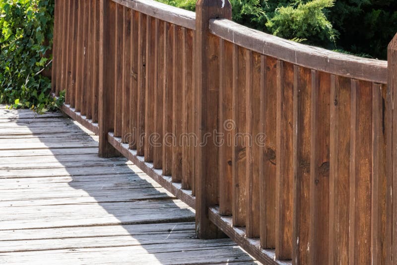 Wooden Handrail of Bridge Over River Stock Photo - Image of outdoor ...