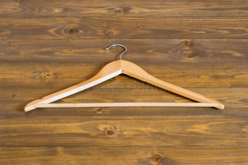 Wooden Hanger on a Dark Table Stock Image - Image of metal, concept ...