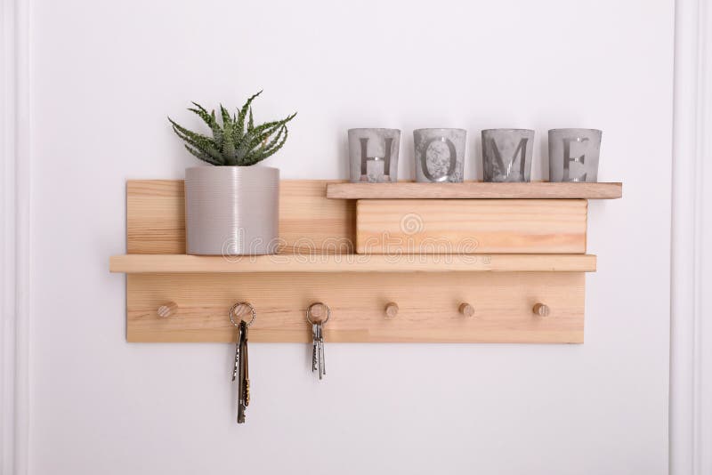 Wooden Hanger for Keys with Decor on White Wall Stock Photo - Image of ...
