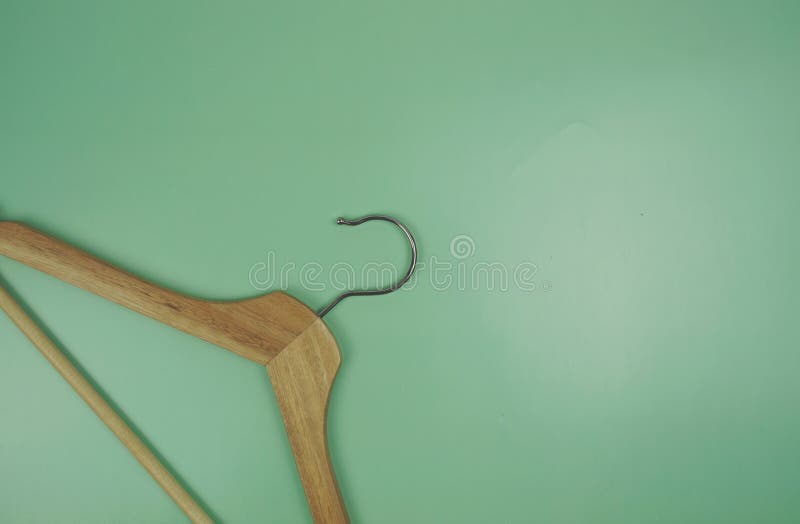 Wooden Hanger Top View on Green Background Stock Image - Image of ...