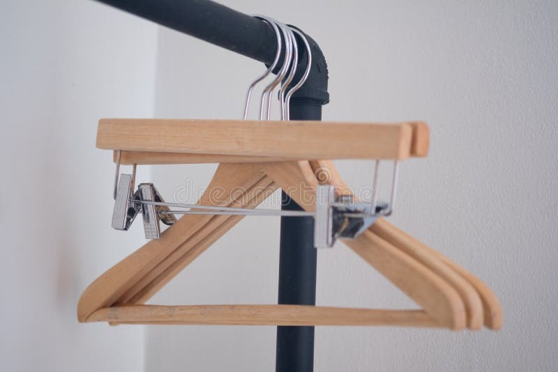 Wooden Hangers on the Rack in Wardrobe Stock Image - Image of fashion ...