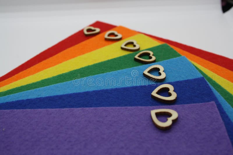 Wooden Hearts on Multi-colored Felt Stock Photo - Image of homosexual ...