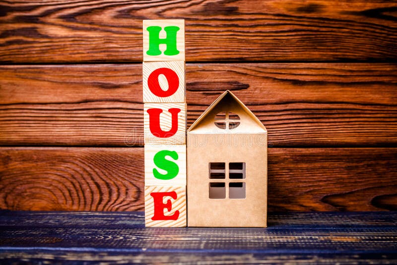 Wooden home and text stock photo. Image of cubes, house - 251489218