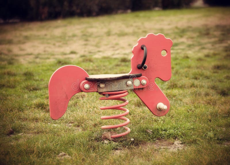 Wooden Horse with Spring in the Playground Stock Image - Image of ...