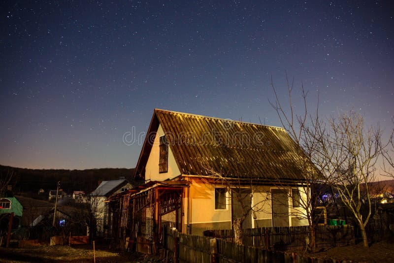 Wooden House on a Background of the Night Sky Stock Photo - Image of ...