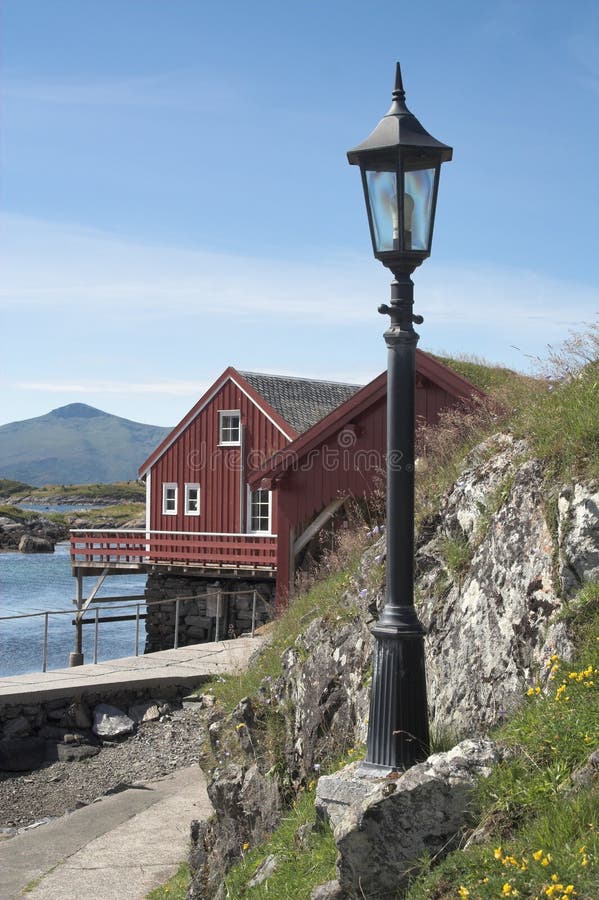 Wooden house on coastline stock photo. Image of stilt - 1505546