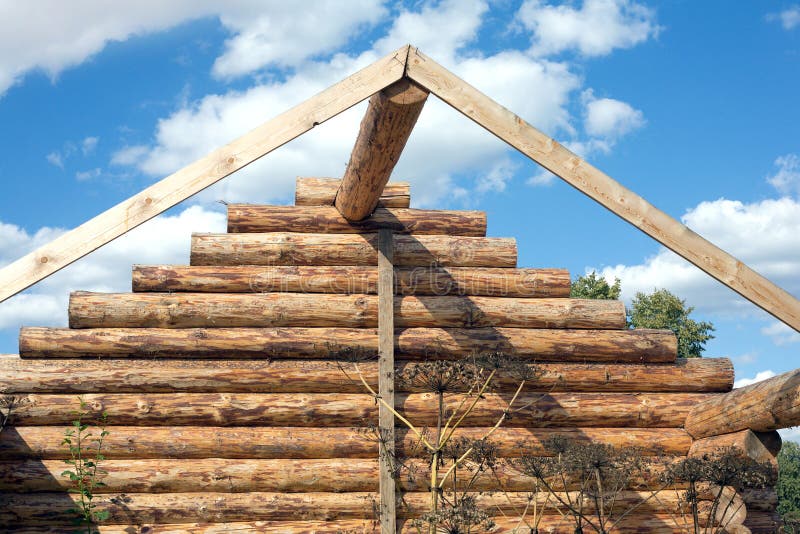 Wooden House Construction from Logs Stock Image - Image of clouds, logs ...