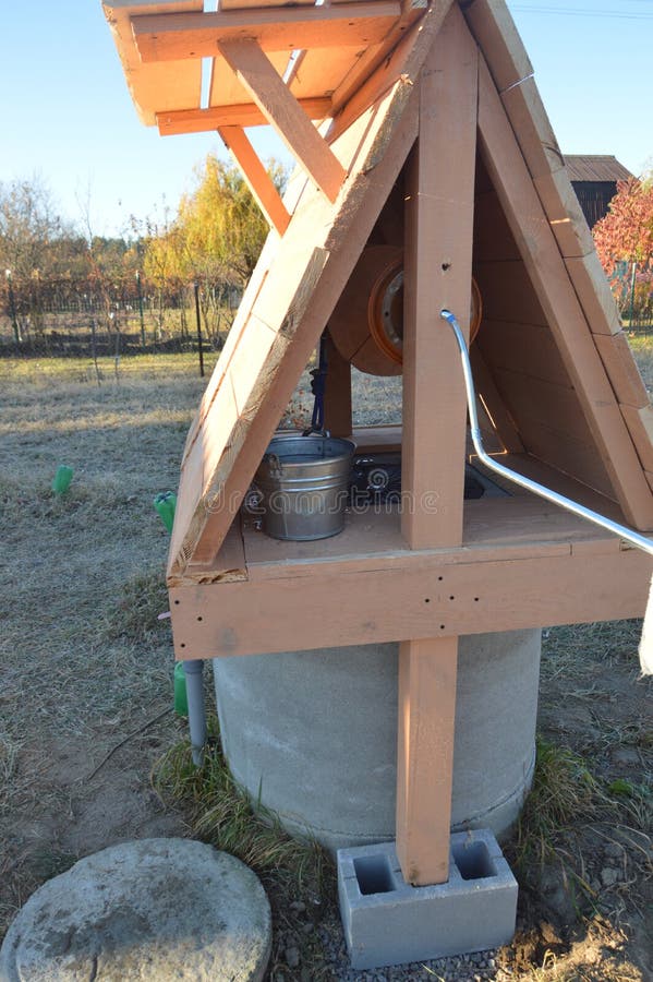 Wooden House for Drinking Water Well Stock Image - Image of drink ...