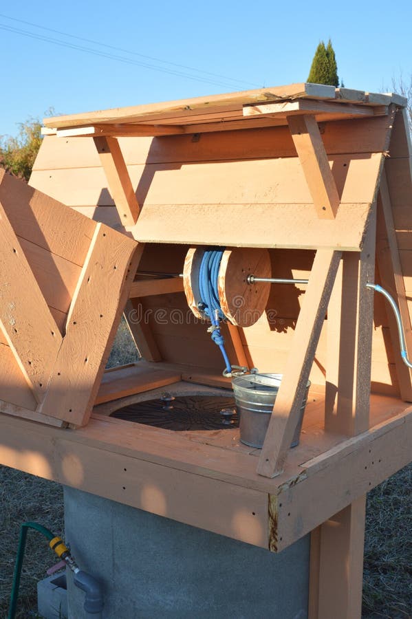 Wooden House for Drinking Water Well Stock Photo - Image of wall ...