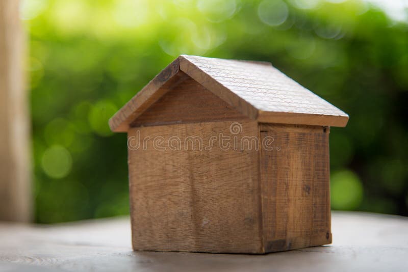 Wooden House on Green Nature Stock Photo - Image of sale, cottage: 98176382