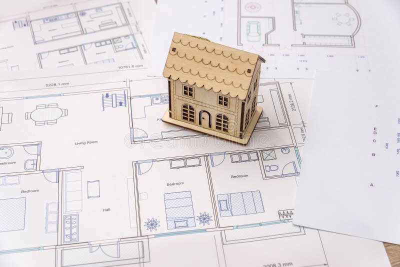 Wooden House Model with Blueprint and Laptop Stock Image - Image of ...