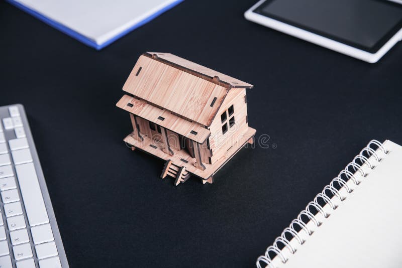 Wooden House Model with Keyboard, Notepad and Tablet Stock Image ...