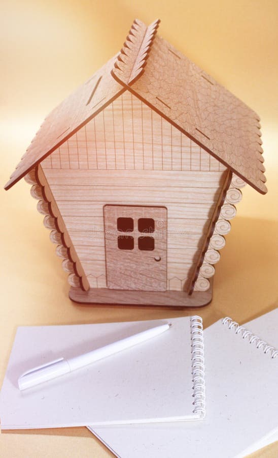 Wooden House Model.Notebook.Toy Wooden House Close Up Stock Photo ...