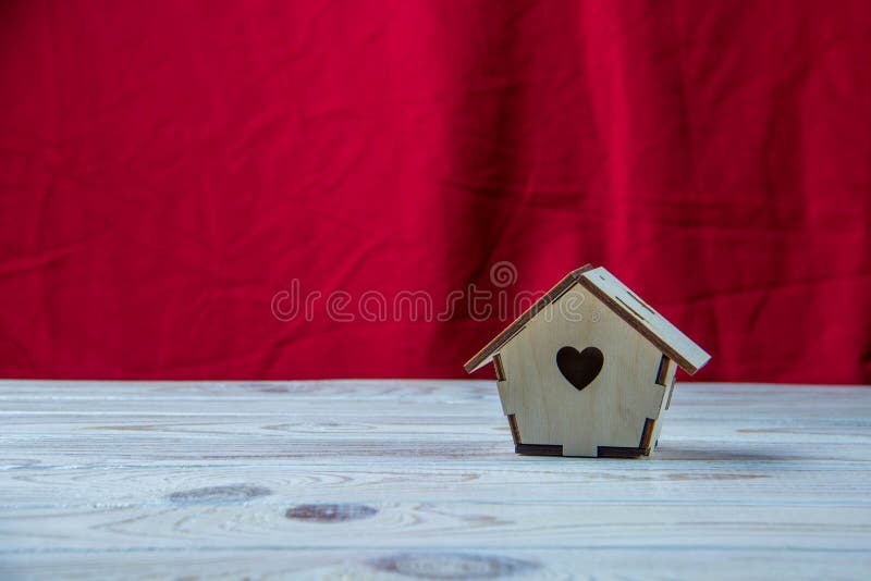 Wooden House on a Red Background Stock Photo - Image of payment ...