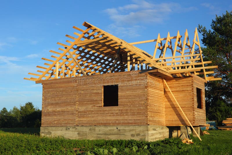 Wooden House Under Construction Stock Photo - Image of construction ...