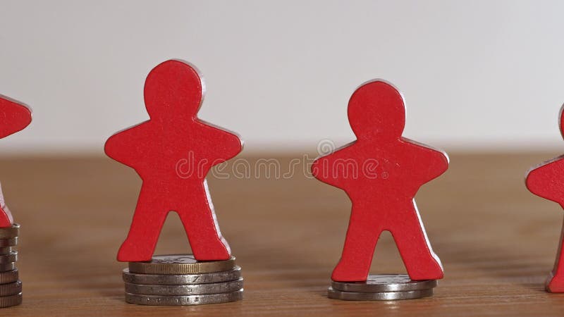 Wooden Human Figure on Stack of Coins for Business Concept Stock Video ...