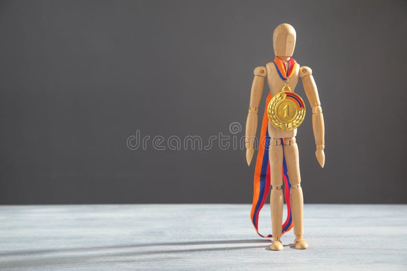Wooden Human Figure with a Winner Medal Stock Image - Image of teamwork ...