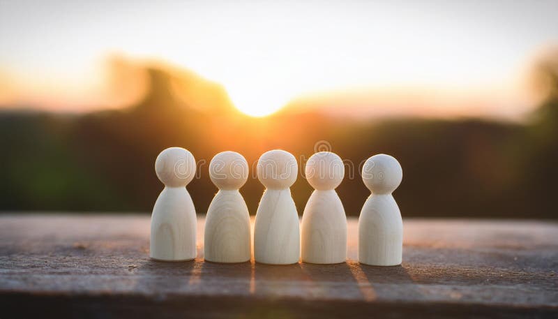 Wooden Human Figures Against Sunset. Unity and Teamwork Concept Stock ...