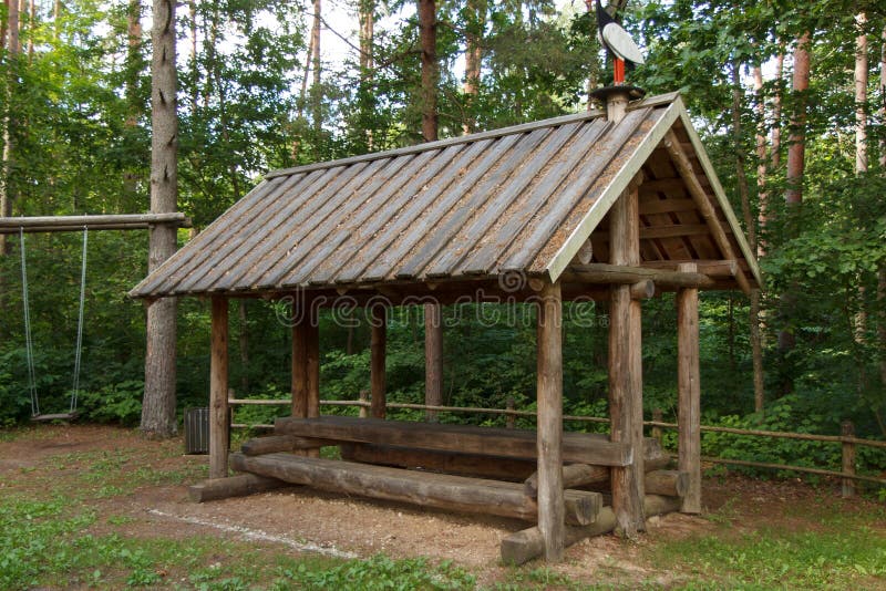 A wooden hut stock image. Image of tree, grass, trees - 98033891
