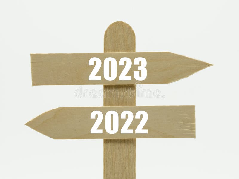 Wooden Indicator Sign with the Year 2023 and 2022 Stock Image - Image ...