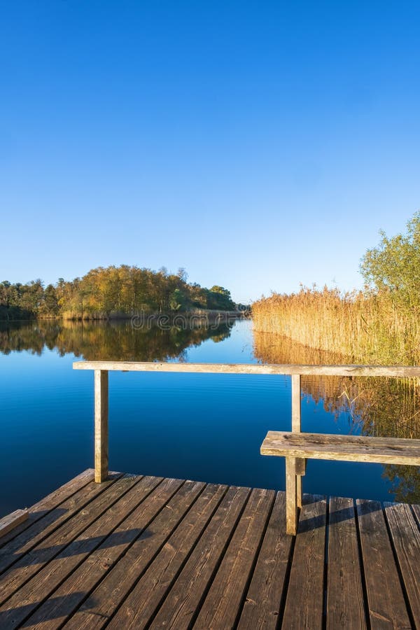 Wooden Jetty by a Lake in Autumn Stock Photo - Image of fall, beautiful ...