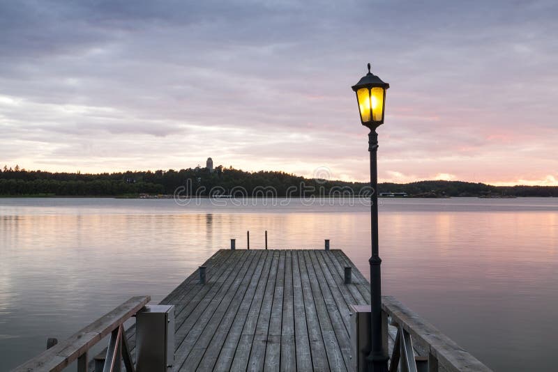 Wooden Jetty with One Lamp on it. Stock Image - Image of hope, space ...