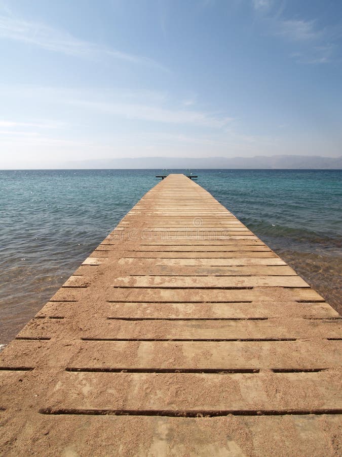 Wooden jetty over sea stock photo. Image of beach, architecture - 3538126