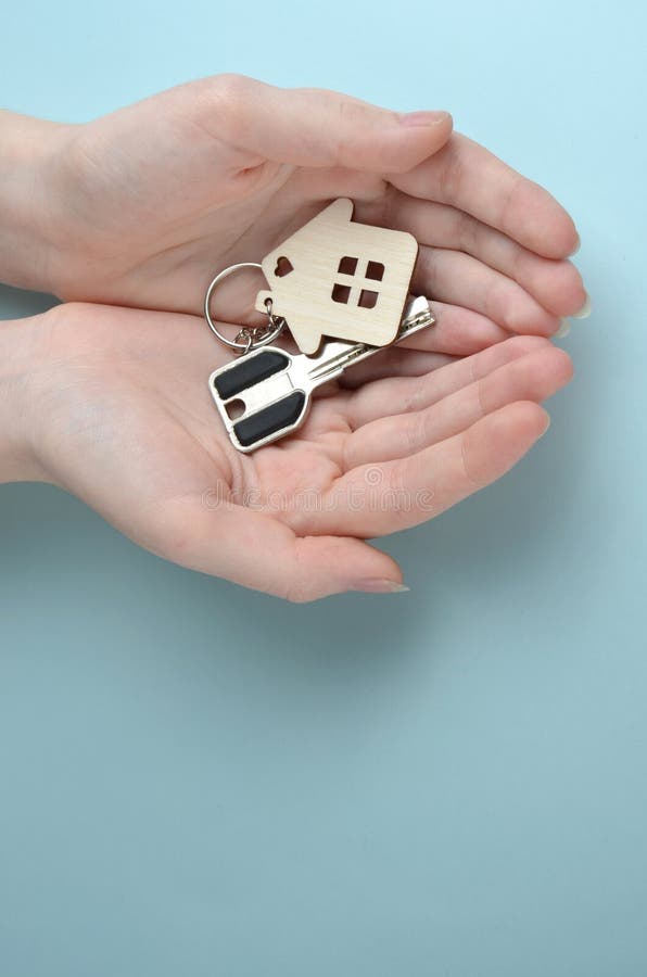 Wooden Keychain Shape House Key Hands Blue Background Stock Photos ...
