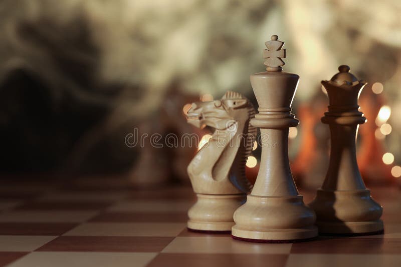 Wooden King, Queen and Knight on Chessboard, Selective Focus. Space for ...