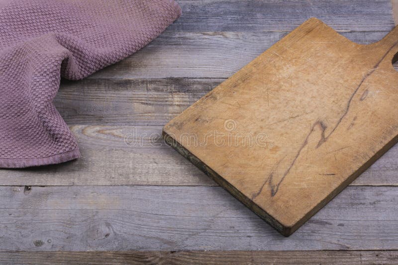 Wooden Kitchen Board on a Dark Wooden Table Top View Stock Image ...