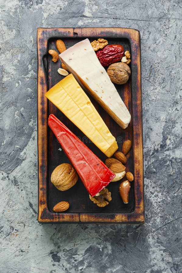 Delicious Cheese on the Table Stock Photo - Image of plate, chunk ...