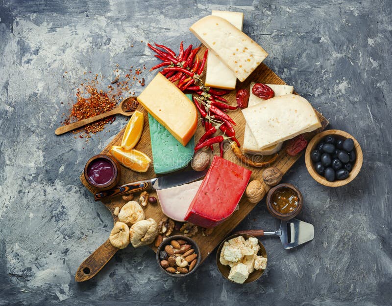 Delicious Cheese on the Table Stock Photo - Image of chunk, flat: 169863872