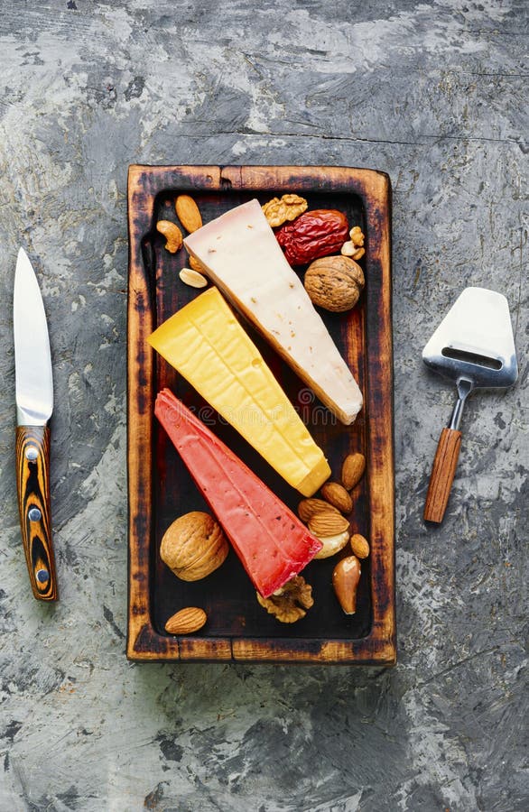 Delicious Cheese on the Table Stock Photo - Image of assortment, chunk ...