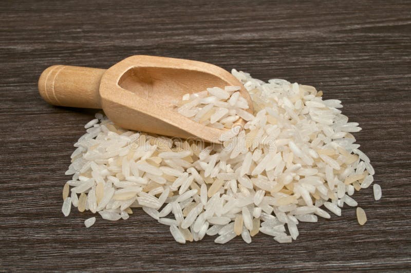 A Wooden Kitchen Shovel with Basmati Rice Stock Image - Image of white ...