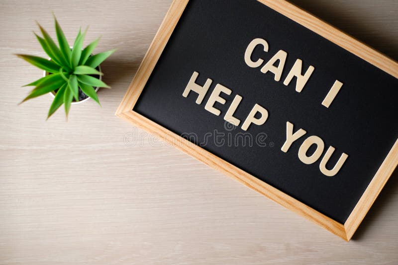 Wooden Letters "CAN I HELP YOU" on the Blackboard. Stock Photo - Image ...