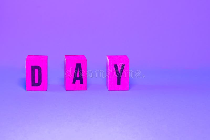 Wooden Letters with the Word DAY on Blue Background Stock Photo - Image ...