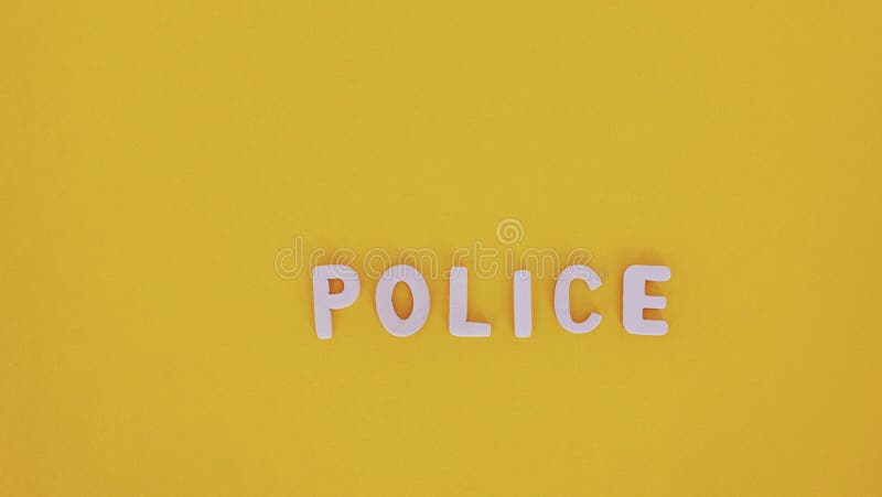 Wooden Letters on a Yellow Background, Superscript Police Stock Photo ...