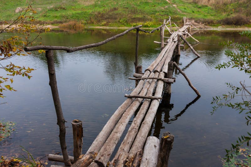 Wooden log bridge stock photo. Image of flowing, landscape - 164763968