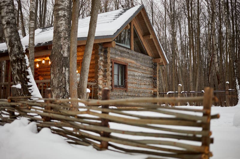 Wooden Log-house with Illuminated Terrace in Stock Photo - Image of ...