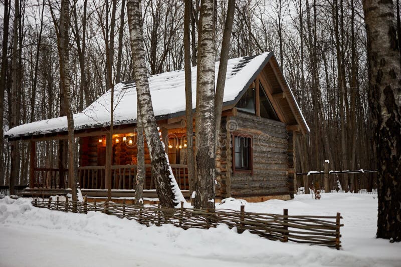 Wooden Log-house with Illuminated Veranda in Stock Image - Image of ...