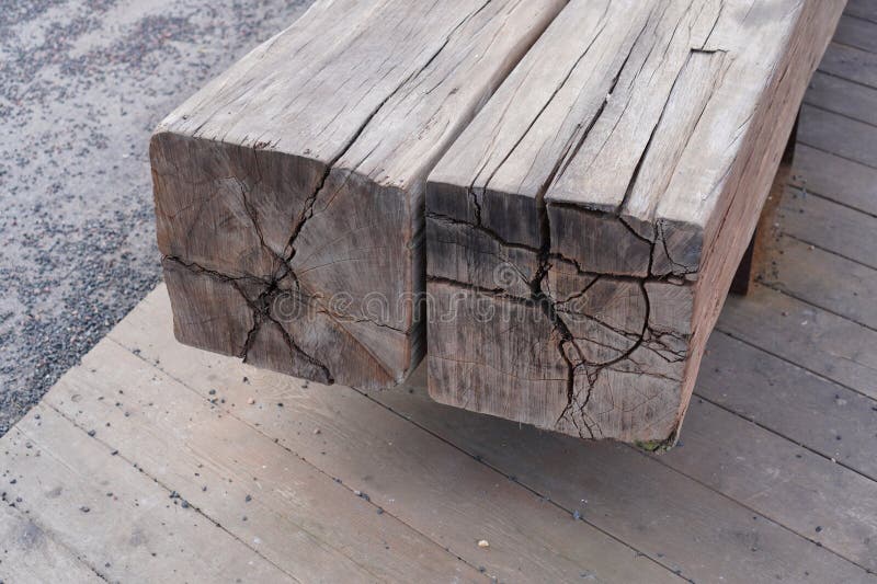 Wooden Logs Joined Together on a Rustic Wooden Platform Showing Cracks ...